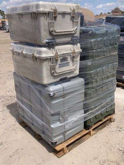 Approximately five military style hard plastic cargo containers ...
