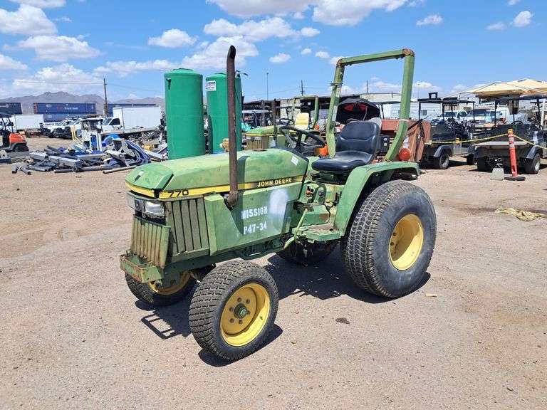 John Deere 770 Tractor - Sierra Auction Management Inc