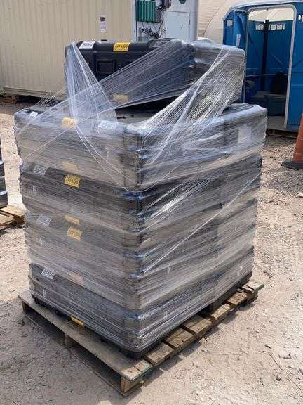 Approximately nine military style hard plastic cargo containers ...