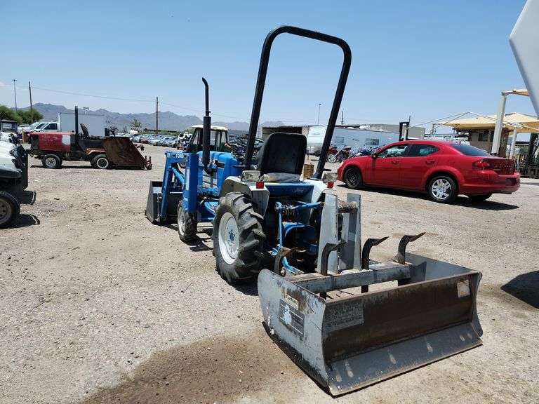 Ford 7106 Backhoe Tractor - Sierra Auction Management Inc