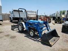 Ford 7106 Backhoe Tractor - Sierra Auction Management Inc