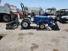 Ford 7106 Backhoe Tractor - Sierra Auction Management Inc