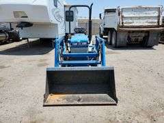 Ford 7106 Backhoe Tractor - Sierra Auction Management Inc