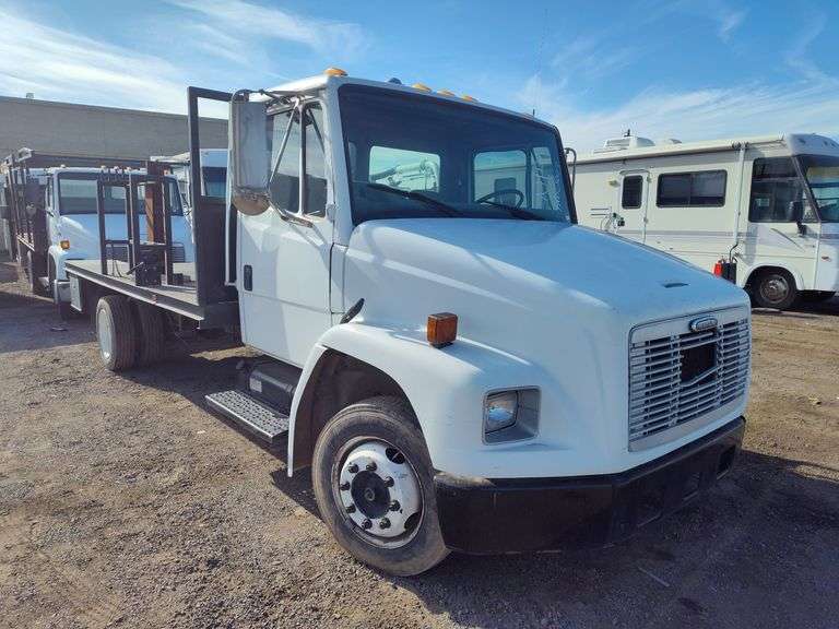 1999 Freightliner FL50 Flatbed Truck - Sierra Auction Management Inc