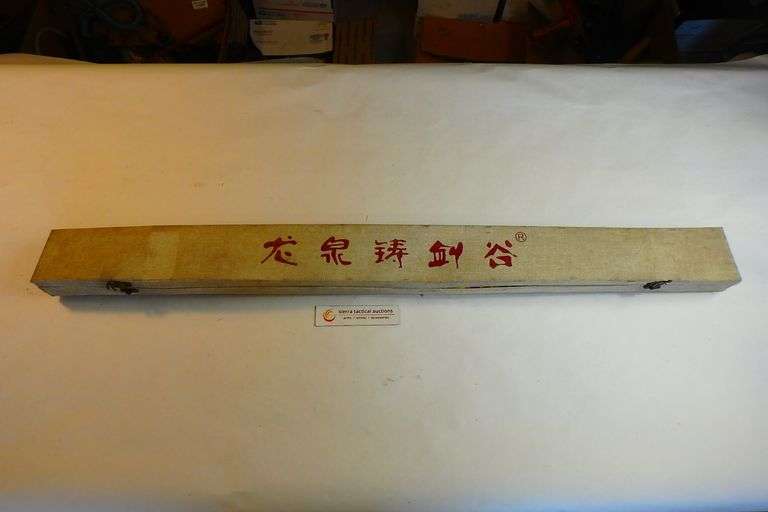 SWORD IN A BOX WITH CHINESE WRITING ON IT - Sierra Tactical Auctions, Inc.
