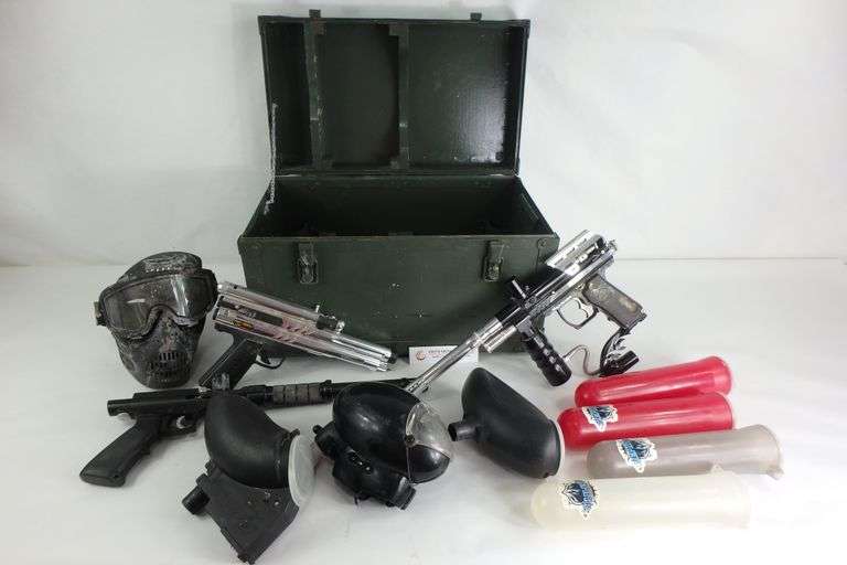 FOOT LOCKER TYPE BOX (1'9" x 1' x 1' approx) W/ PAINTBALL GUNS & ACCS ...