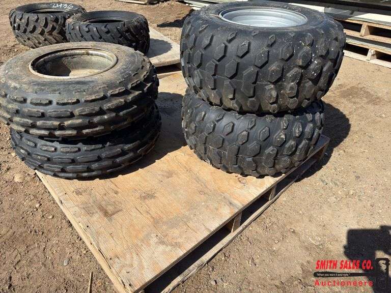 Set of four wheel tires - Smith Sales Co. Auctioneers