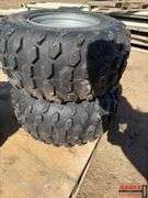 Set of four wheel tires - Smith Sales Co. Auctioneers