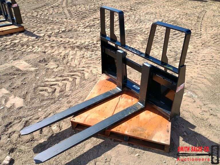 Kivel Step-Through Skidsteer Forks - Smith Sales Auctioneers LLC