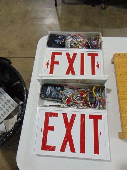 2 Exit Signs - Bright Star Real Estate Services