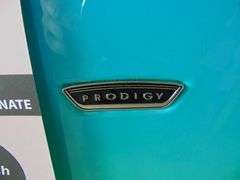 Prodigy Medium Rolling Suitcase - Bright Star Real Estate Services
