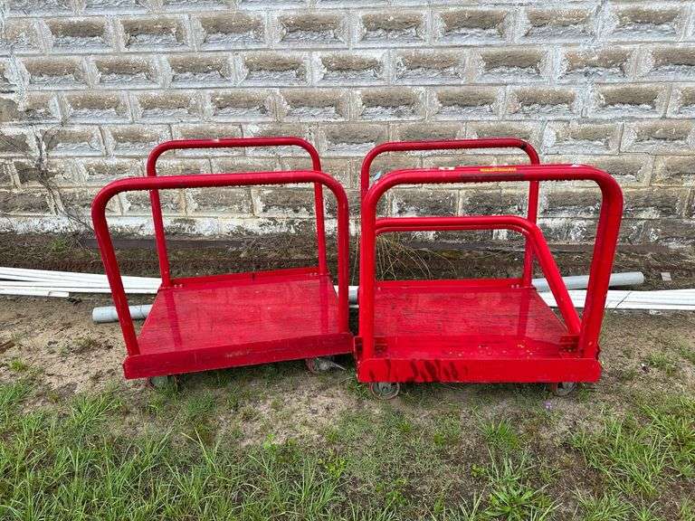 Two Red Metal Platform Carts with Casters - South Auction