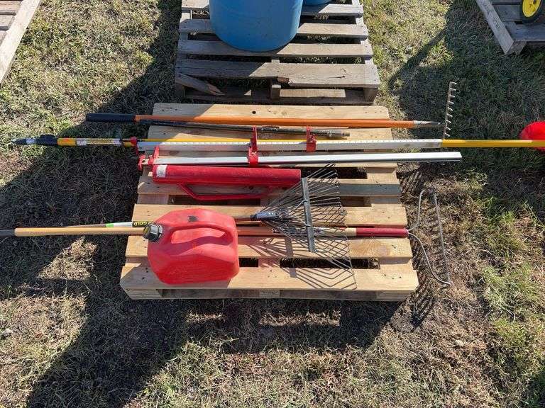 Pallet with rakes, extension handle clamps etc - Taylors Auctioneers Ltd