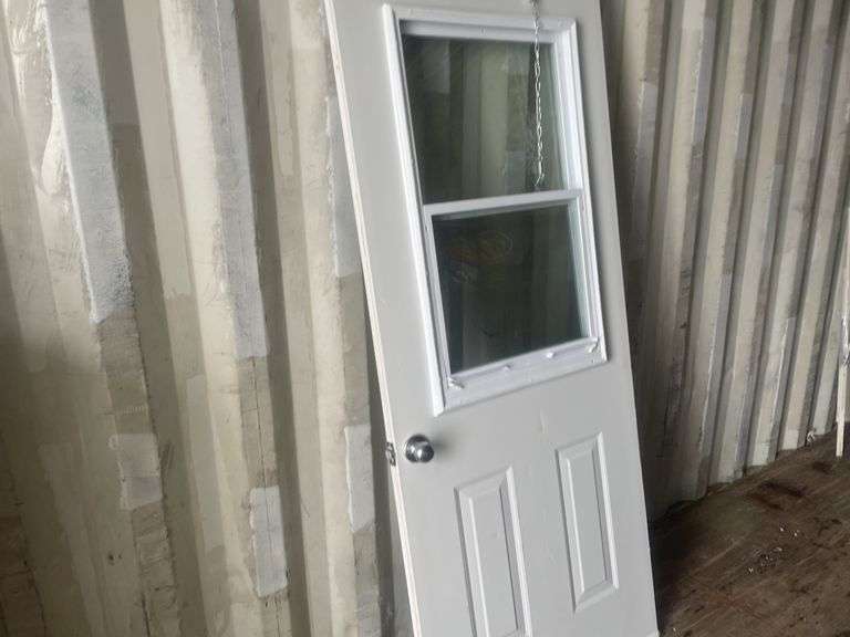 Used Storm door measures 34" x 80" comes with window including screen ...