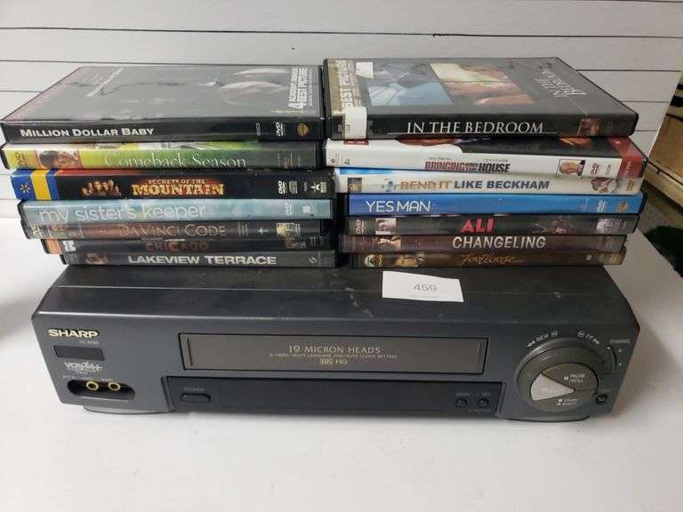 Sharp VHS Tape Player & DVDs - Trice Auctions