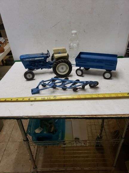 Blue Metal Tractor Good Condition Some Rust - Trice Auctions