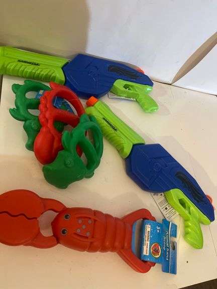 2 Water Guns, 3 Sand Diggers, Animal Sand Scoop - Trice Auctions