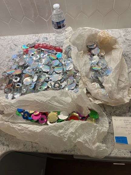 Nine 12‘ silver holiday garland and one multicolor garland - Trice Auctions