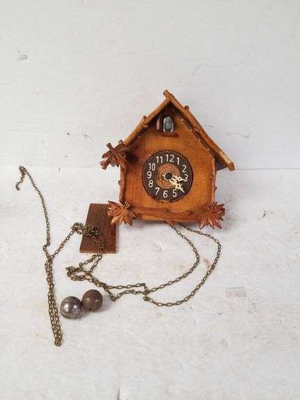 Vintage Wooden Cuckoo Clock with Chains - Trice Auctions