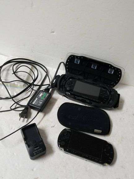 Sony PSP with accessories - Trice Auctions