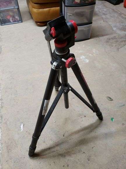 Red Accent Camera Tripod - Trice Auctions