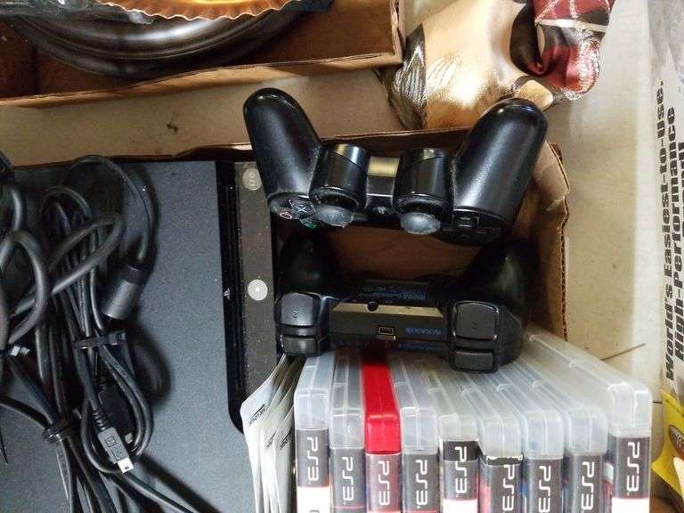 PS3 Game Console, Two Game Controllers And Assorted Games - Trice Auctions