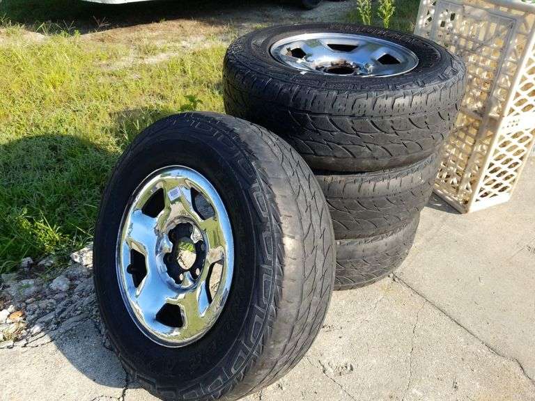 Ford 17" 6 Lug Rims W/ 265/70R17 Tires - Trice Auctions