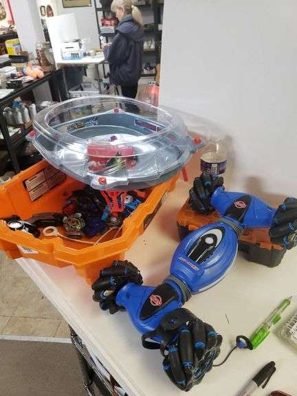Remote-Controlled Stunt Car and Beyblade Battle Arena Set - Trice Auctions