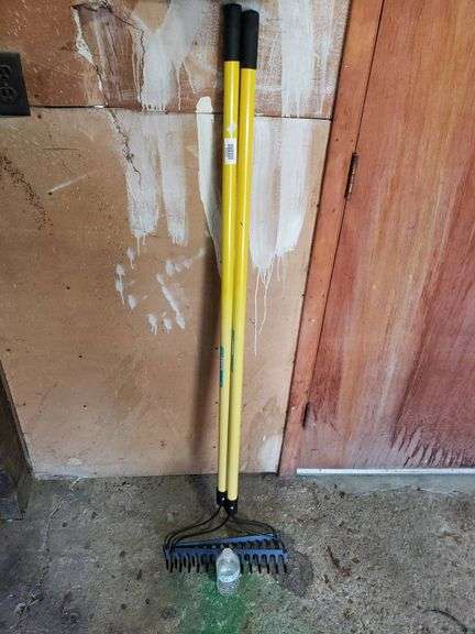 Dual-Handled Garden Rake with Yellow Handles and Black Metal Tines ...