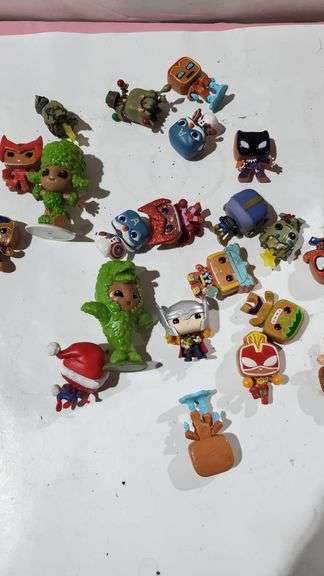 Miniature Figurines Featuring Comic and Cartoon Characters - Trice Auctions