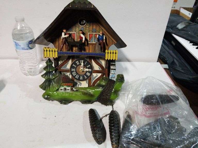 Decorative Cuckoo Clock with Figures and Chain Weights - Trice Auctions