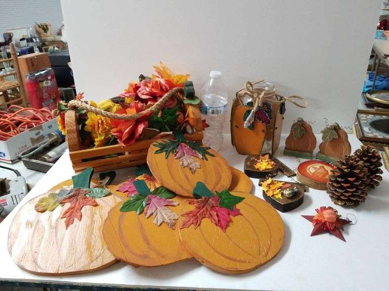 Collection of Fall-Themed Decorations with Pumpkins and Floral Accents ...