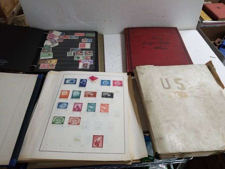 Assorted Stamp Collection in Albums Featuring Worldwide and U.S. Stamps - Trice Auctions