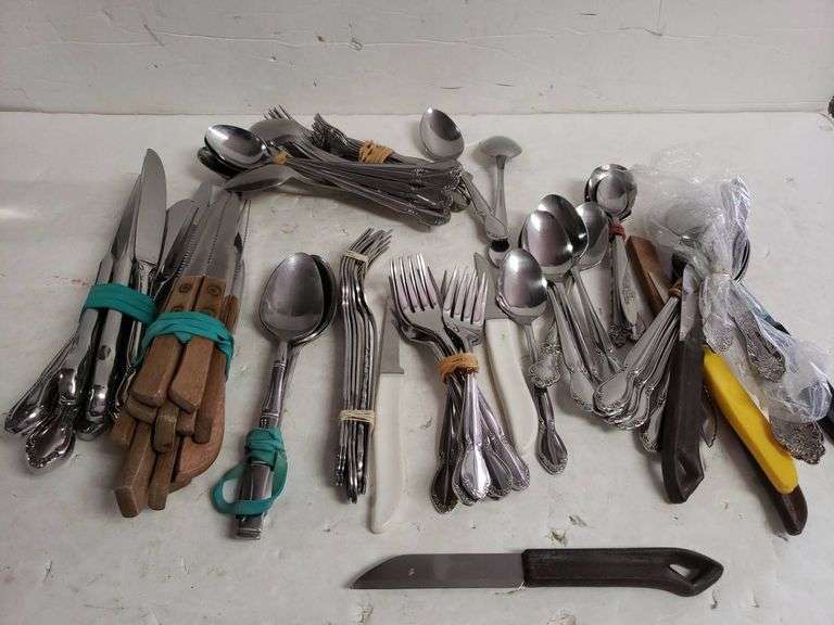Assorted Flatware Collection With Knives, Forks, Spoons, And Utensils - Trice Auctions