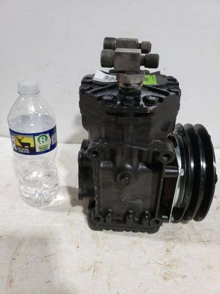 Industrial Black Compressor with Dual Connections and Pulley - Trice Auctions