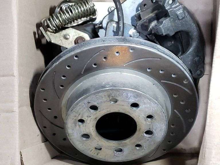 Automotive Brake Rotor and Caliper Assembly With Spring Components ...