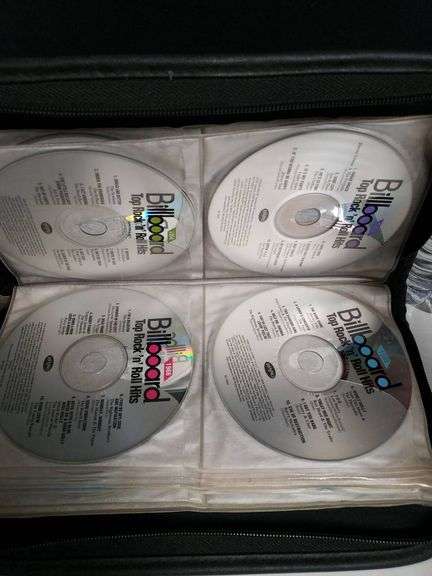 Collection of Mixed Music CDs in Black Carrying Case - Trice Auctions