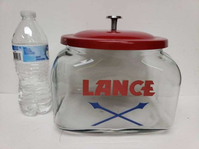 Clear Glass Lance Jar with Red Lid and Logo Featuring Arrows - Trice ...