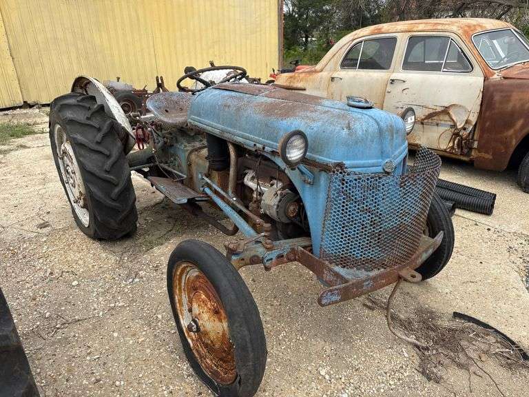 Blue Ford Tractor with Statement ‘Ford Does Not Run’ - Trice Auctions