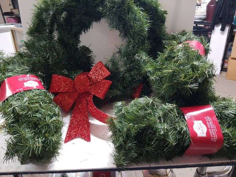 12-Foot Non-Lit Branch Garland with Decorative Red Bow - Trice Auctions