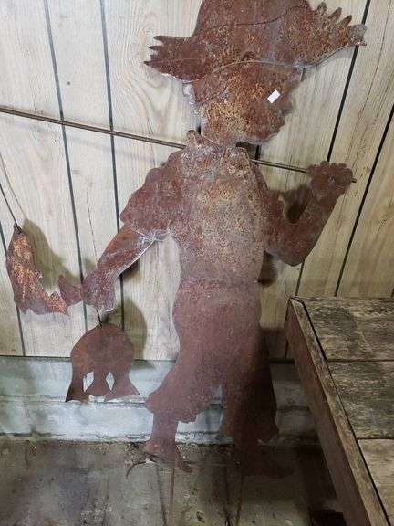 Rusty Metal Silhouette of a Boy with Fishing Pole - Trice Auctions