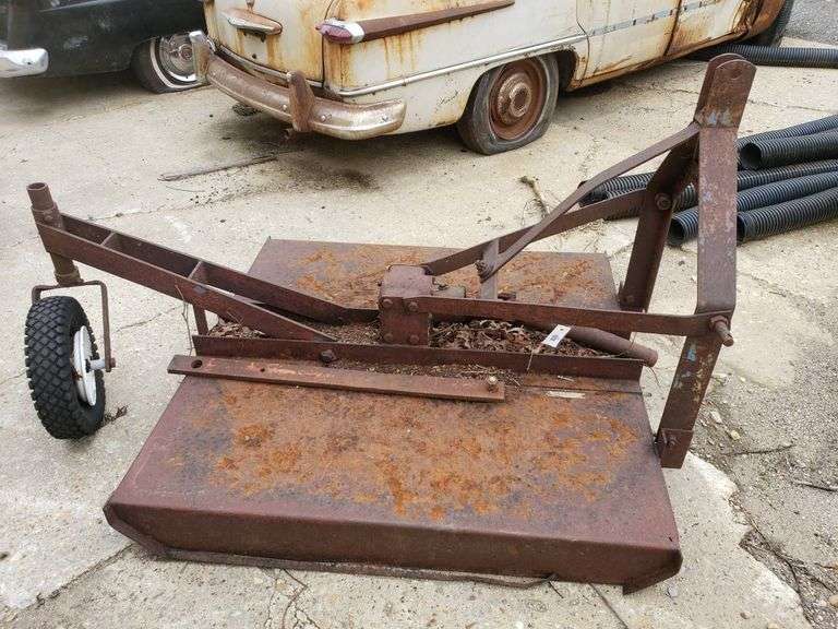 Rusty Metal Rotary Mower Attachment With Single Wheel - Trice Auctions