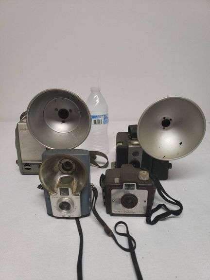 Collection of Vintage Cameras With Flash Attachments - Trice Auctions
