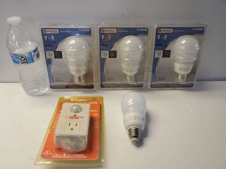 Lot of Utilitech Light Bulbs and Sensor Plug Motion Activated Outlet - Trice Auctions