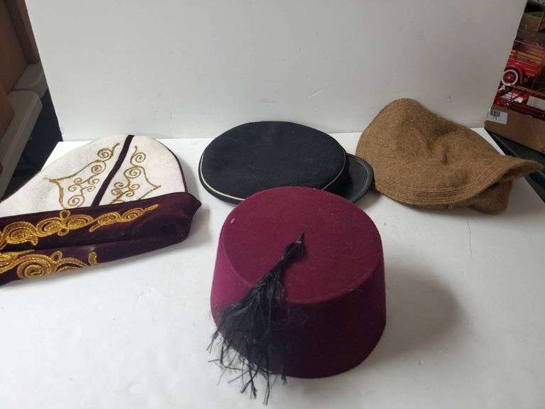 4 Traditional Hats With Various Designs and Materials - Trice Auctions