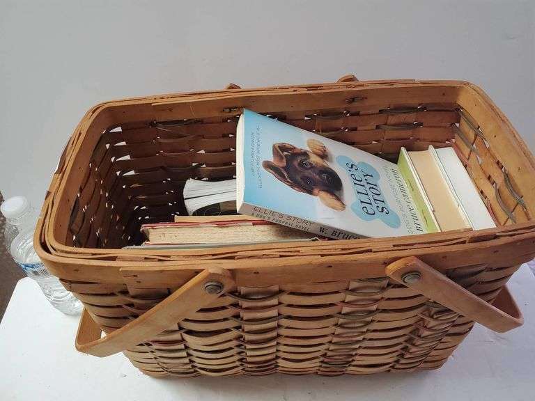 Basket Filled With Assorted Hardcover and Paperback Books - Trice Auctions
