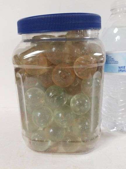 Jar of Transparent Spherical Objects With Additional Loose Contents ...