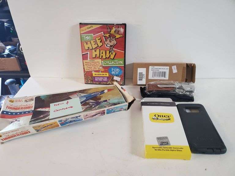 Lot with DVD Collection, Phone Case, Knife, and Miscellaneous Items - Trice Auctions