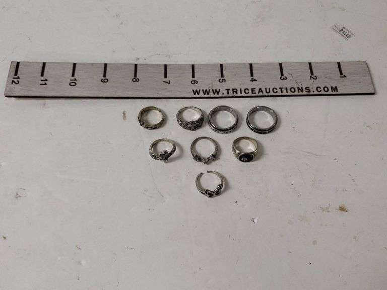 Collection of Assorted Decorative Rings with Various Designs - Trice ...