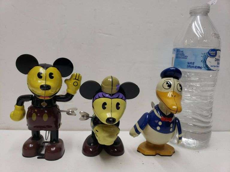 Three Disney Character Wind-Up Tin Toys - Trice Auctions